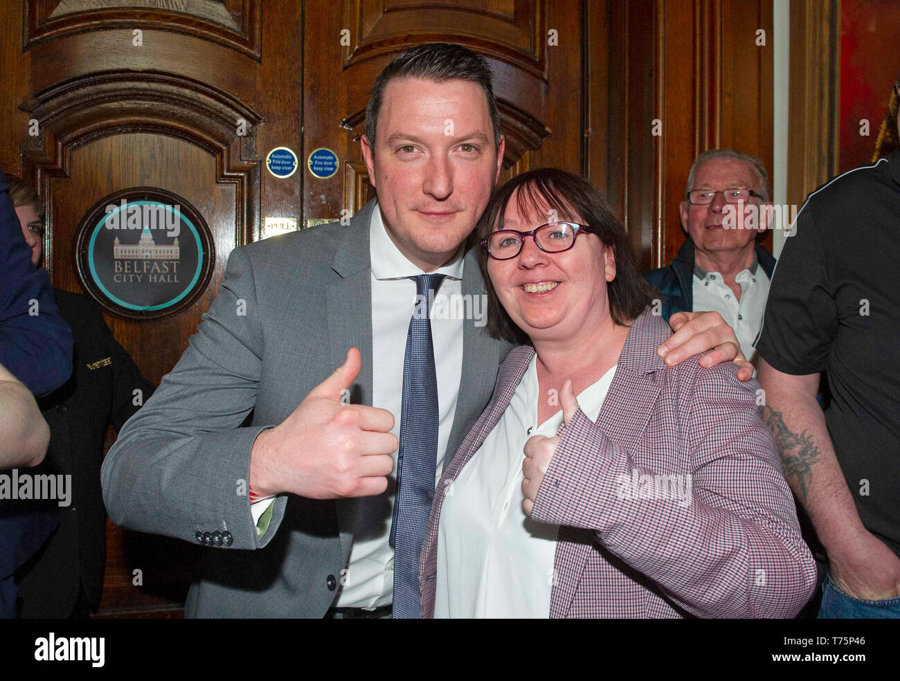 Sinn Fein's John Finucane celebrating with party colleague Mary Ellen ...