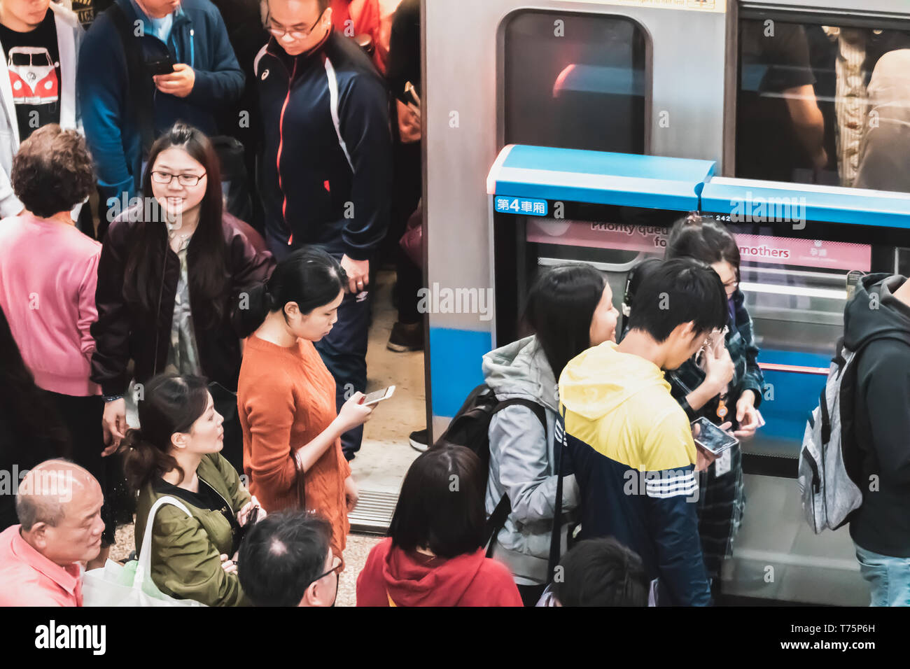 Taipei, Taiwan: Crowd of arrival commuter leaving a cram and crowded ...