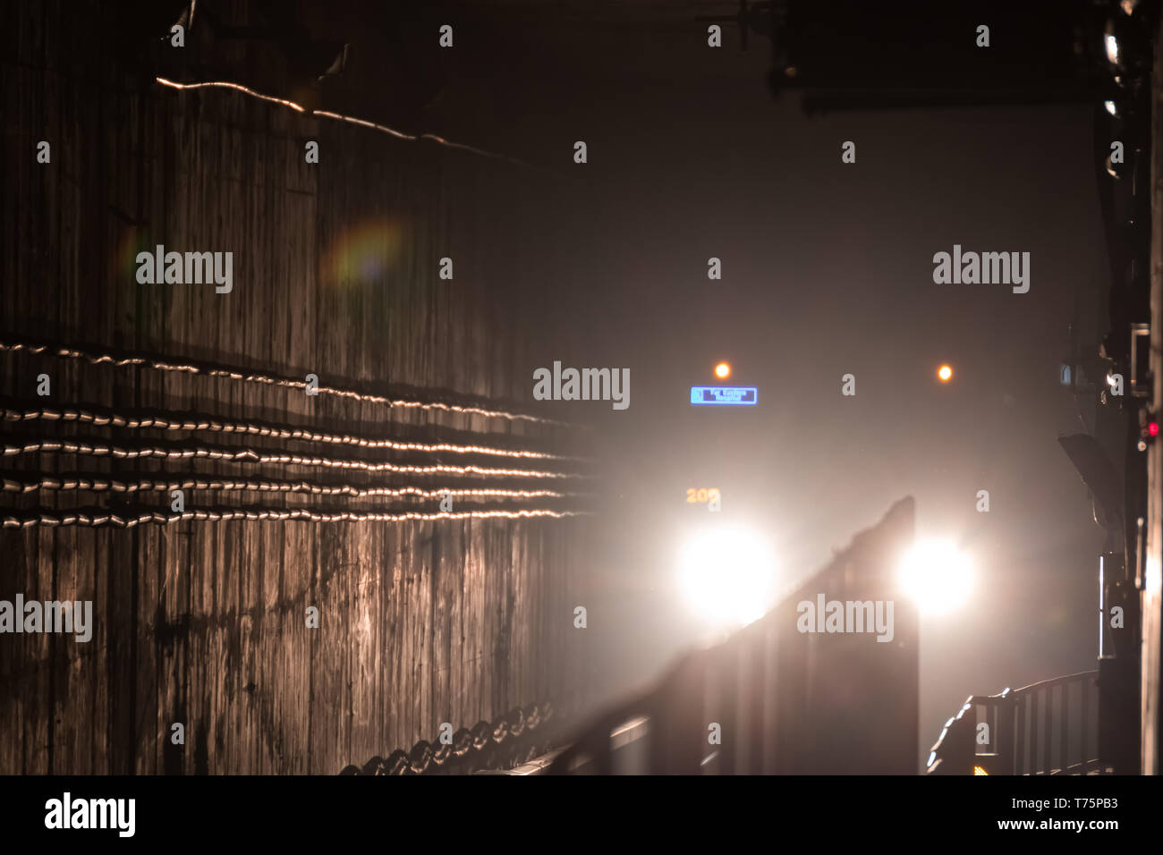 Incoming Underground Taiwanese Metro Train in a Dark Tunnel in Taipei ...