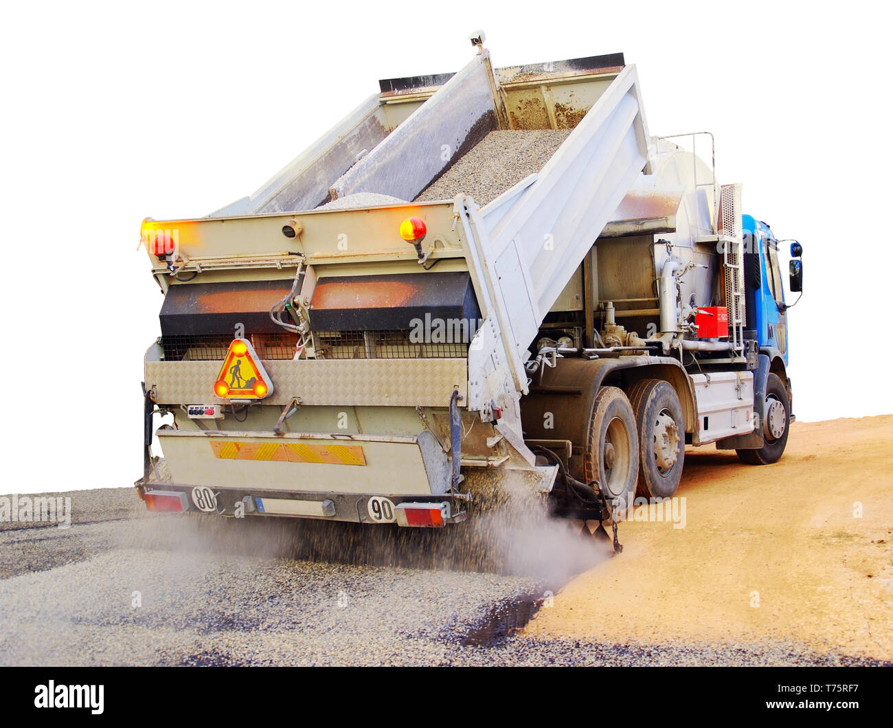 Tar truck in action. White background Stock Photo - Alamy