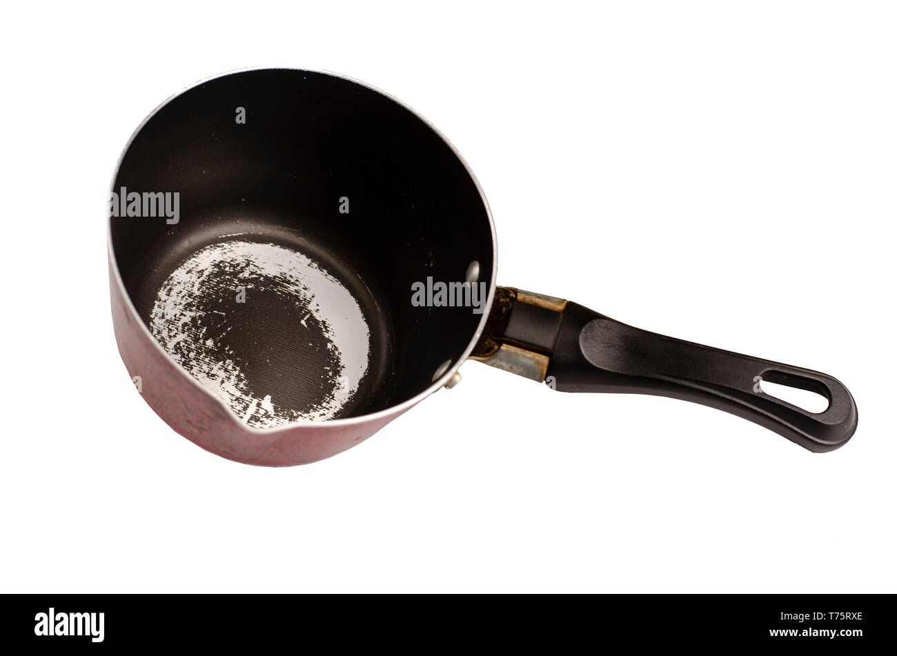 Used cooking pot with damaged coating isolated on white background ...