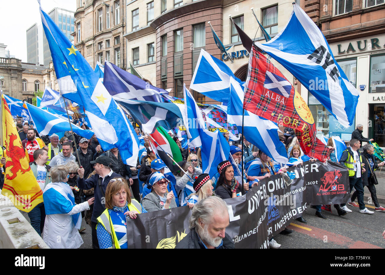 Scottish independence supporters march through Glasgow during the All ...