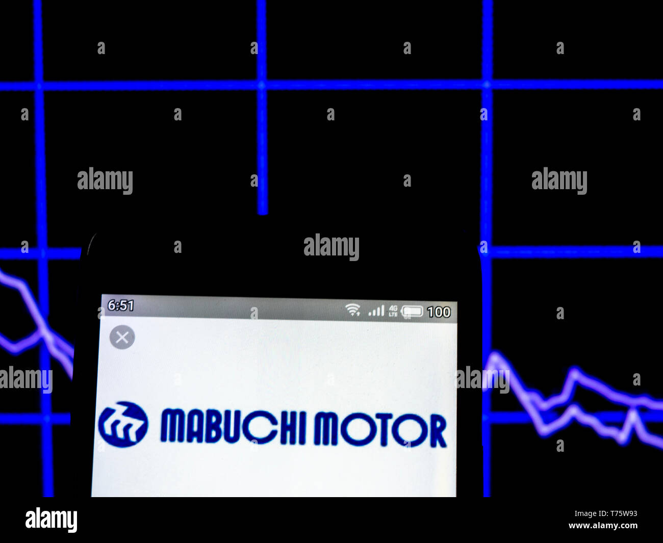 In this photo illustration a Mabuchi Motor Company logo seen displayed ...