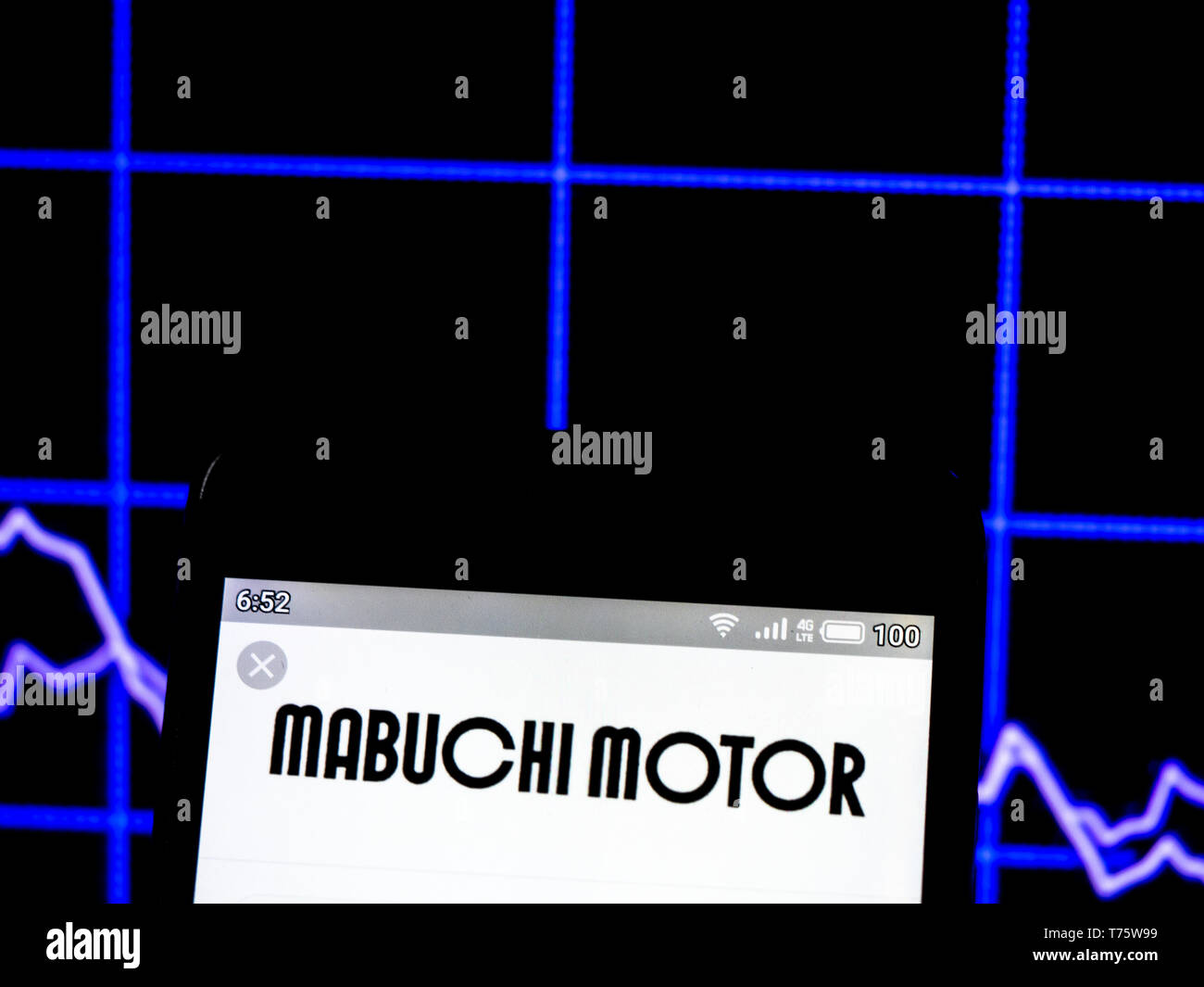In this photo illustration a Mabuchi Motor Company logo seen displayed ...