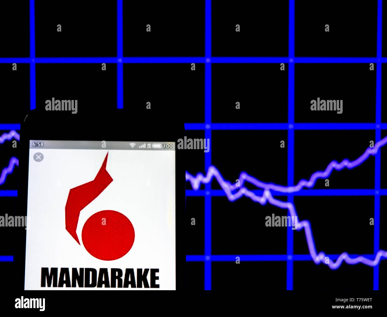 In this photo illustration a MANDARAKE INC. logo seen displayed on a smart phone Stock Photo - Alamy