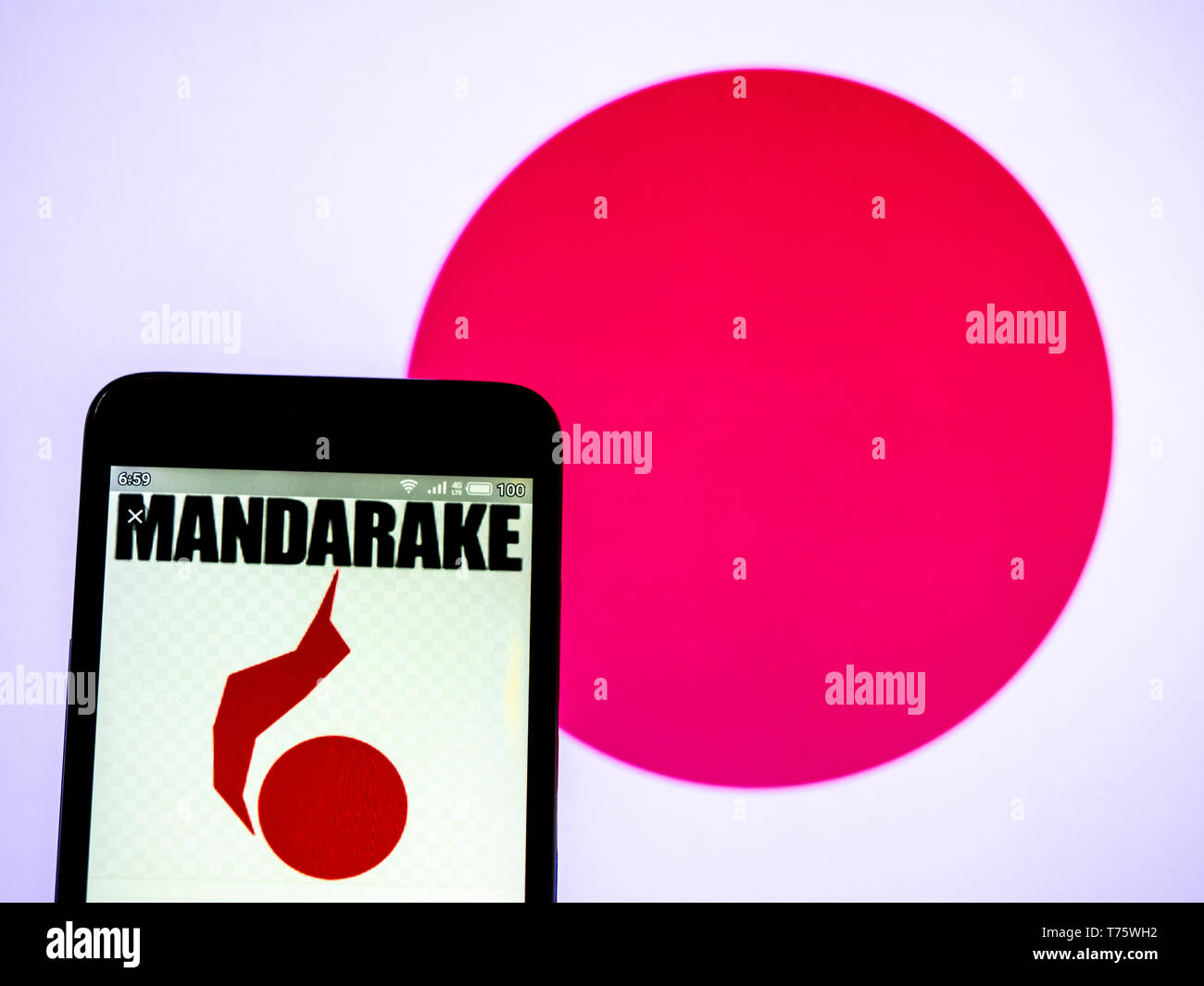 In this photo illustration a MANDARAKE INC. logo seen displayed on a ...