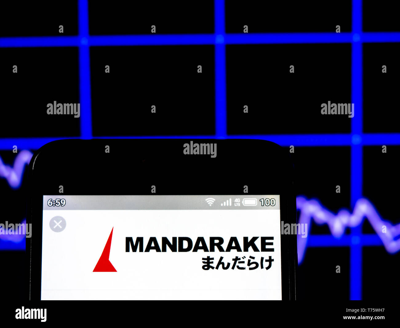 In this photo illustration a MANDARAKE INC. logo seen displayed on a smart phone Stock Photo - Alamy