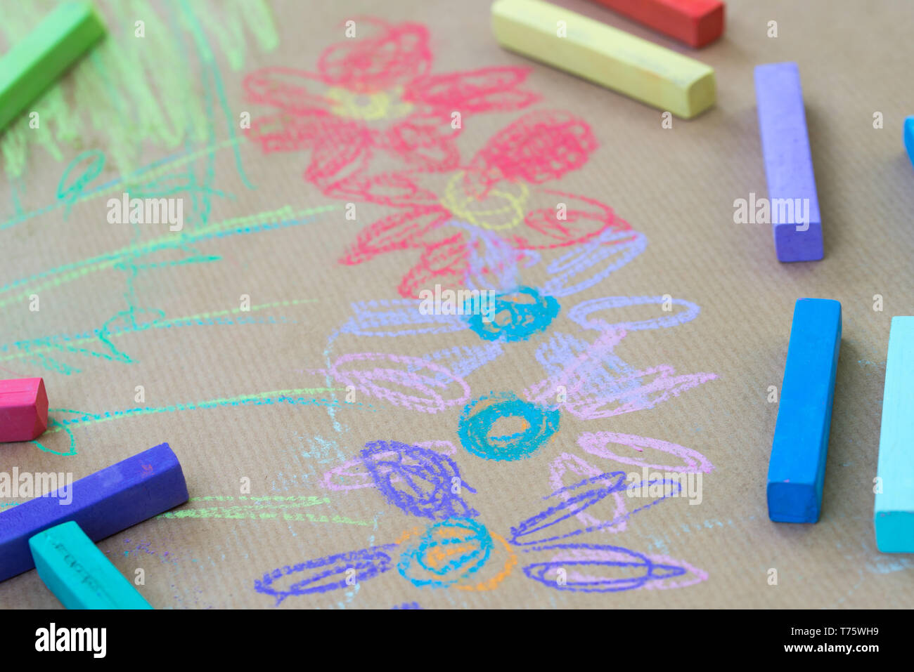 hand drawing on recycled paper - colorful flowers macro Stock Photo - Alamy