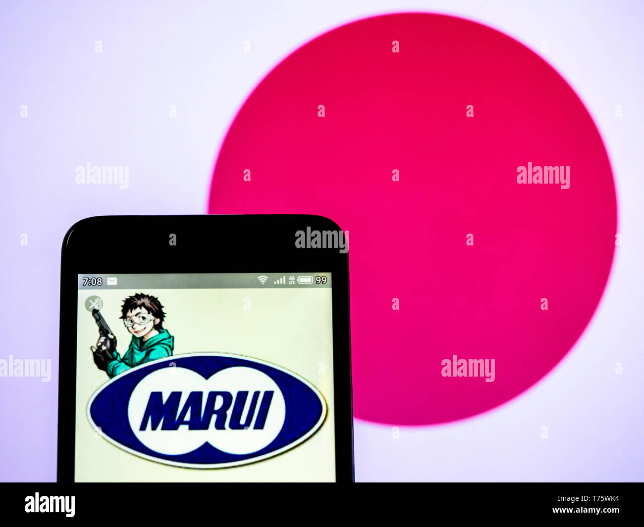 In this photo illustration a Marui Co., Ltd. logo seen displayed on a ...