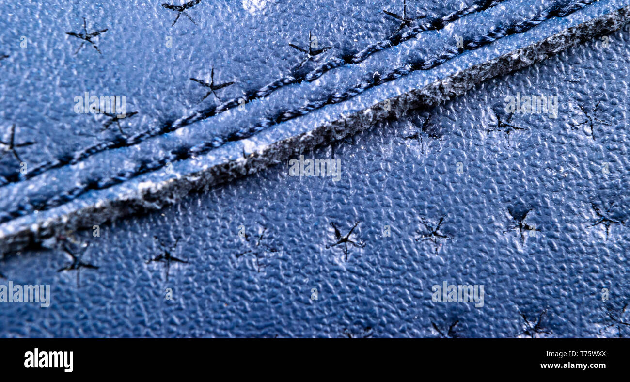 Blue perforated leather texture background. Blue Leather with stitching ...