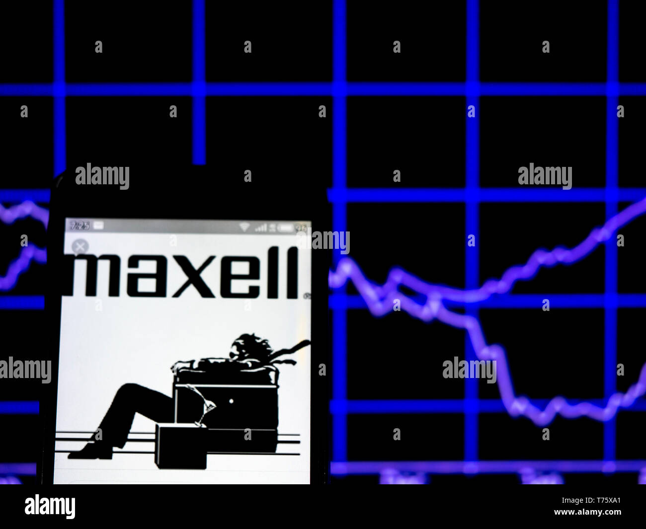 In this photo illustration a Maxell Holdings, Ltd. logo seen displayed ...