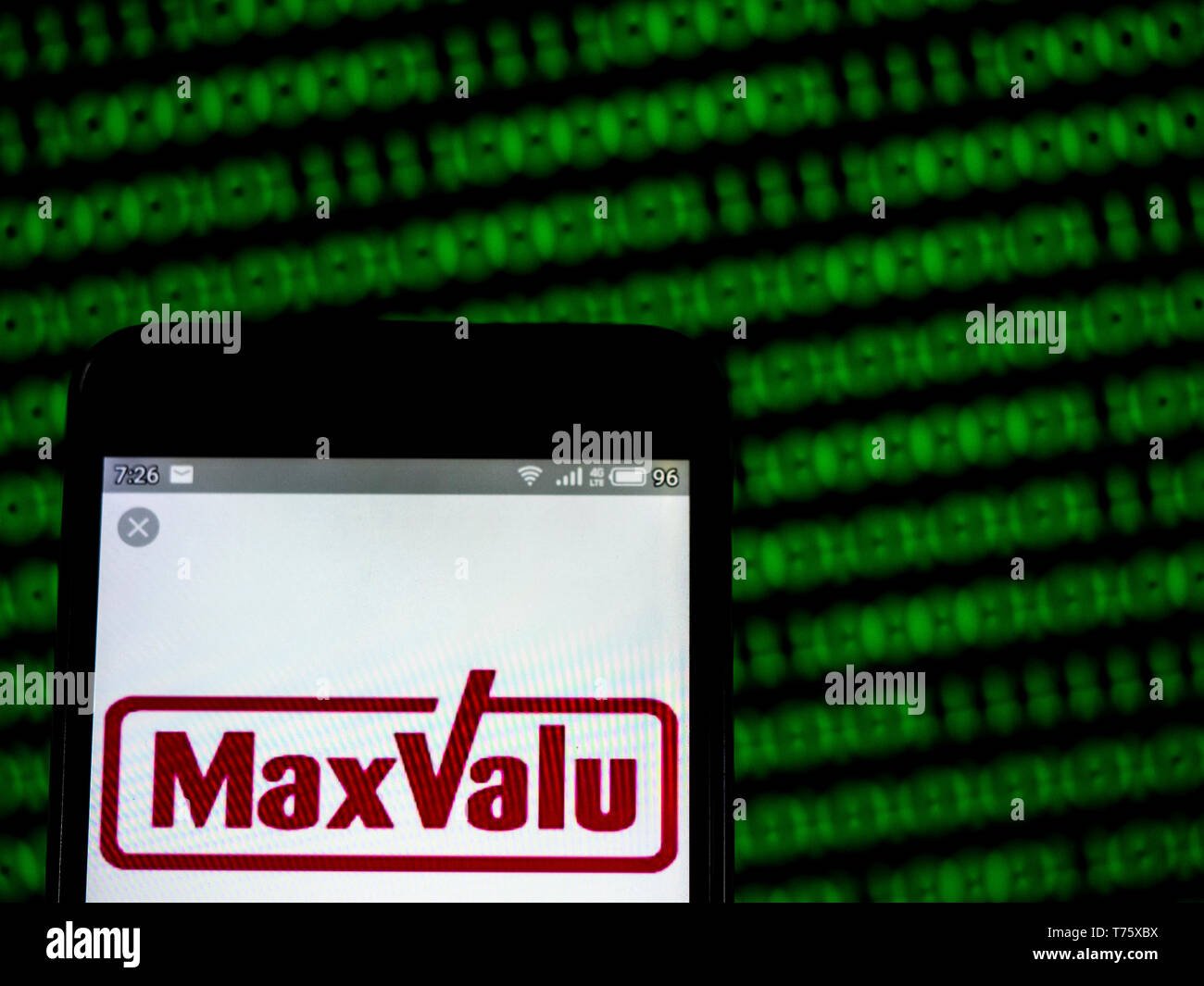 In this photo illustration a Maxvalu Tokai Co., Ltd. logo seen ...