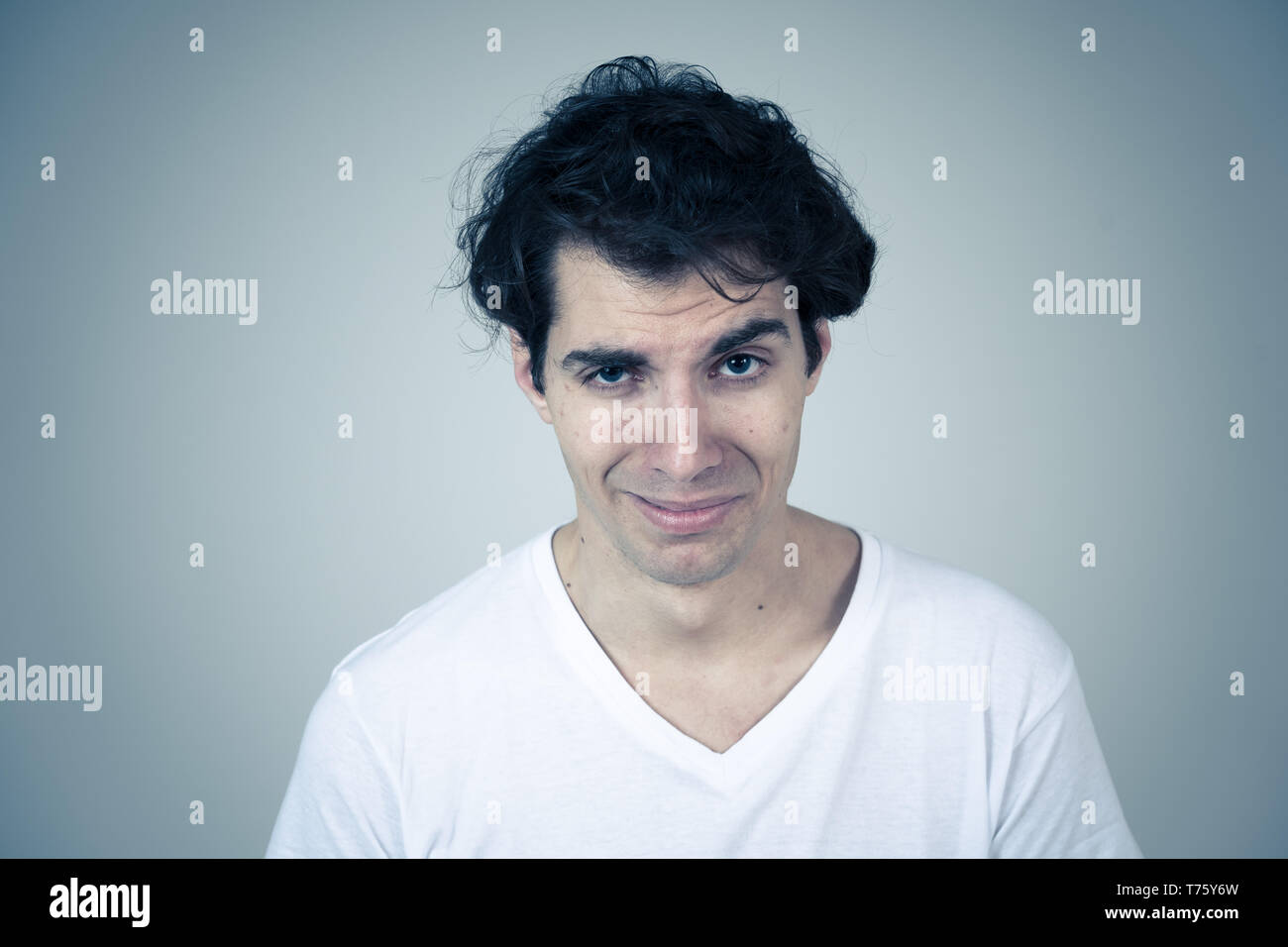 Portrait of young sad man crying in emotional pain looking desperate ...