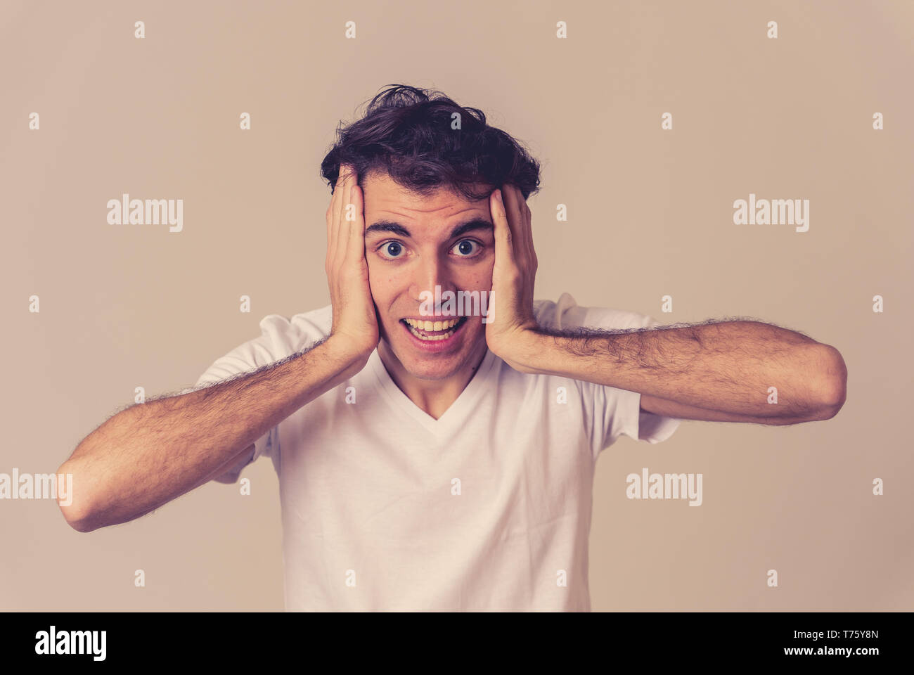 Portrait of Amazed excited funny Man achieving his goal or wining ...