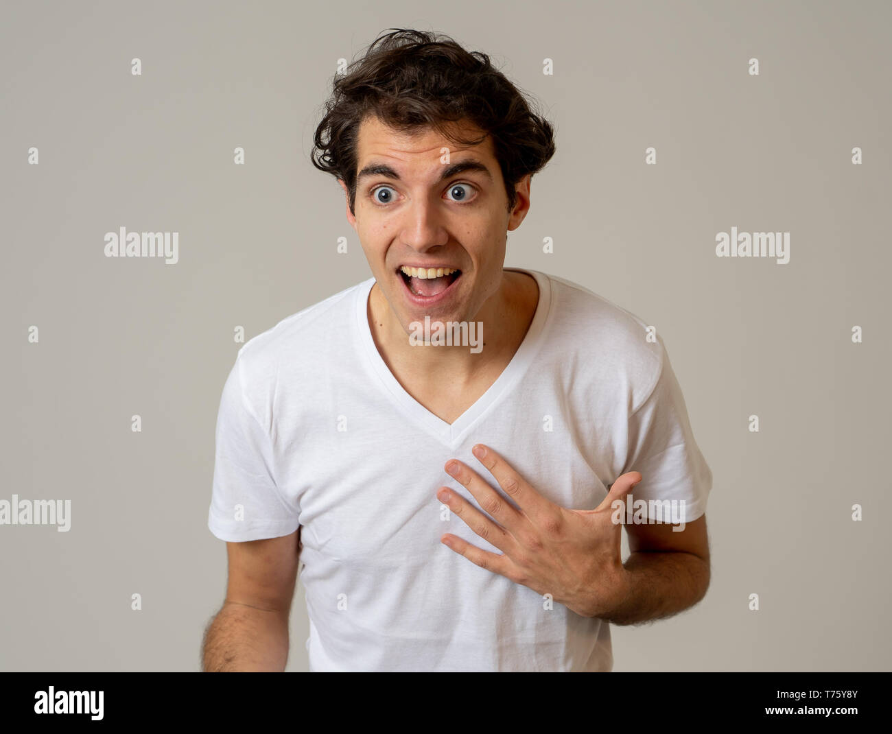 Portrait of Amazed excited funny Man achieving his goal or wining ...