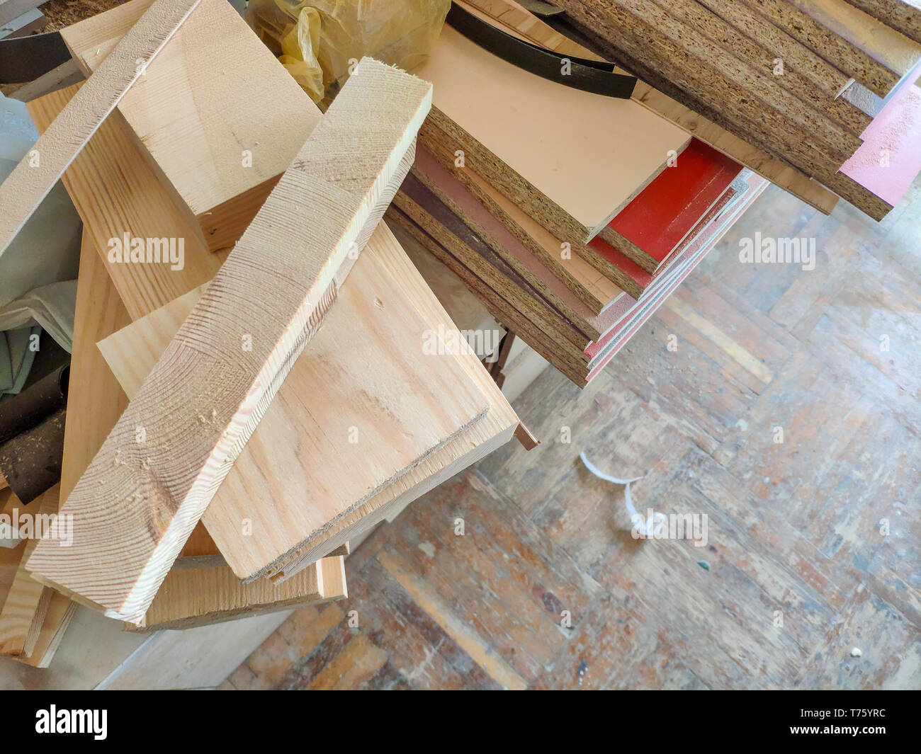 Cut wood pieces remaining from carpenter handcraft at furniture ...