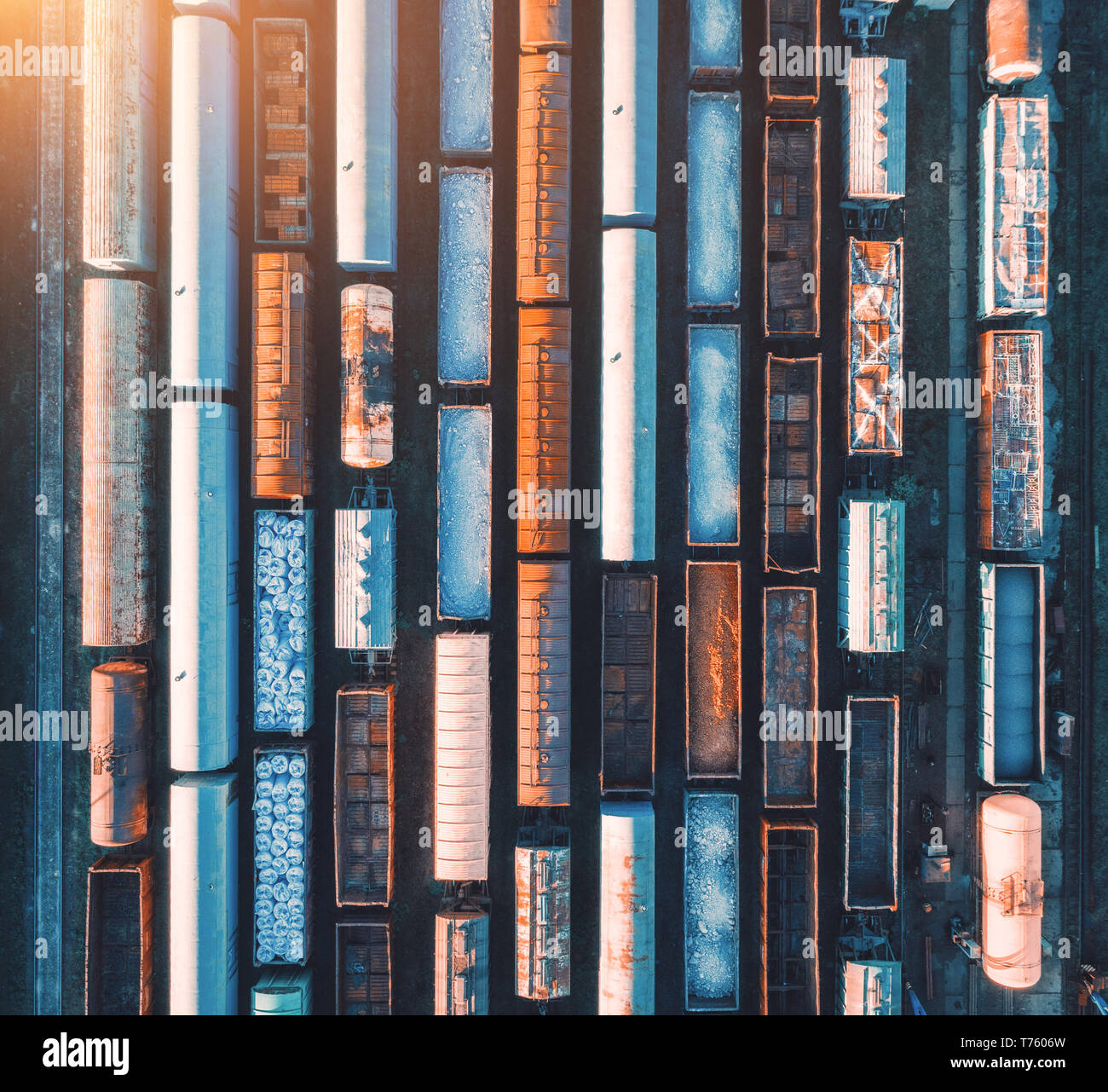 Aerial view of railway wagons. Cargo trains. Top view of colorful ...