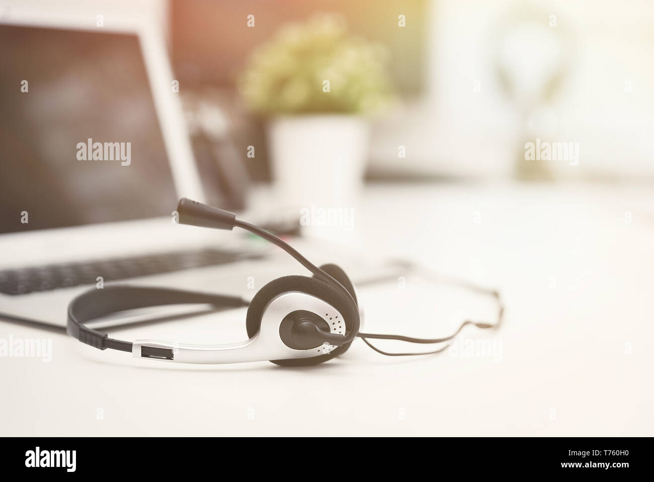 Headset in call center. Hotline support concept in office. Customer ...