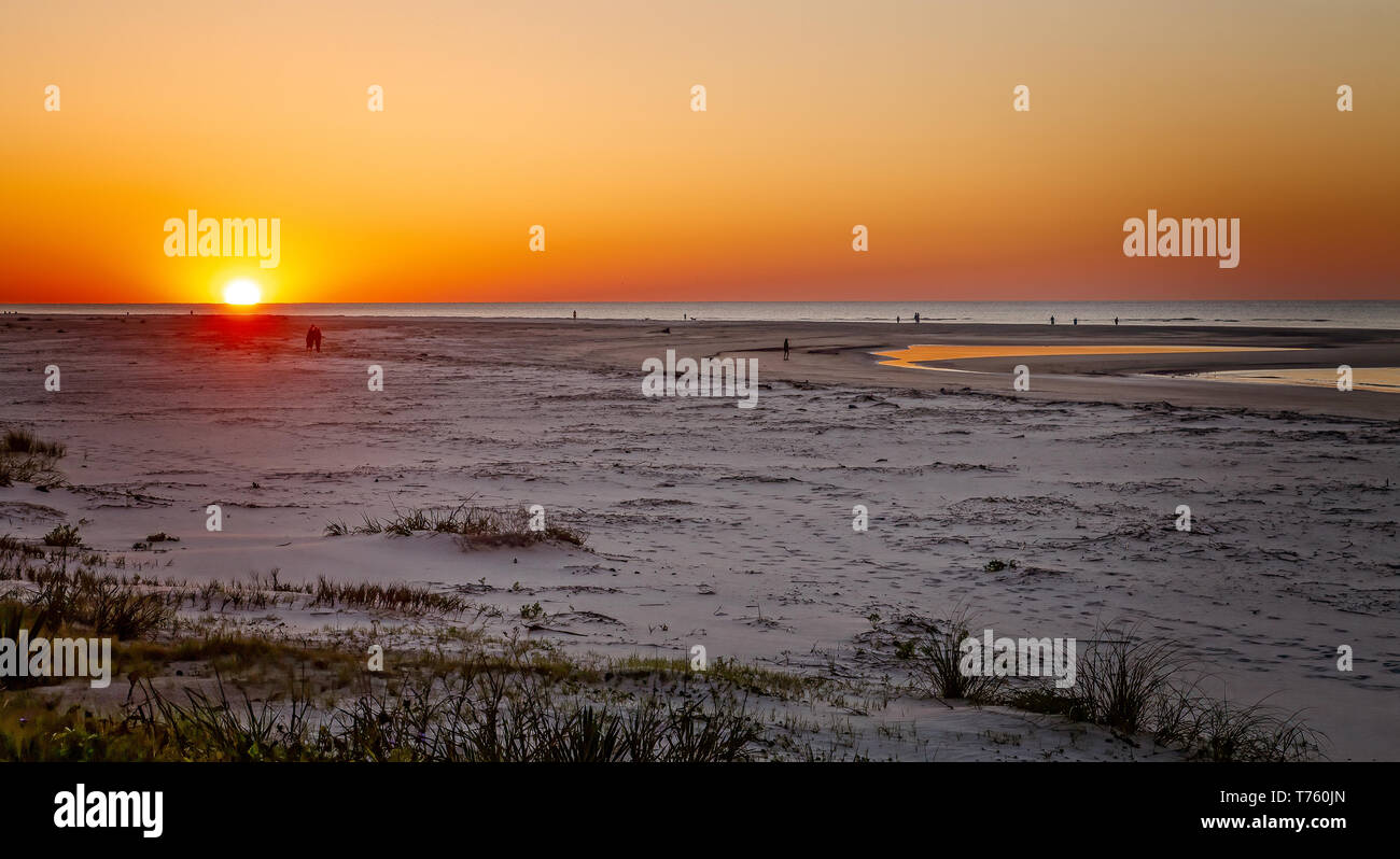 A beautiful sunrise off the coast of St Simons Island in Georgia Stock ...