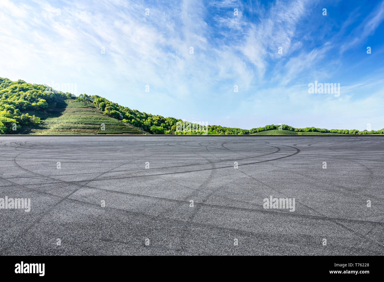 Empty asphalt race track and beautiful natural landscape Stock Photo ...