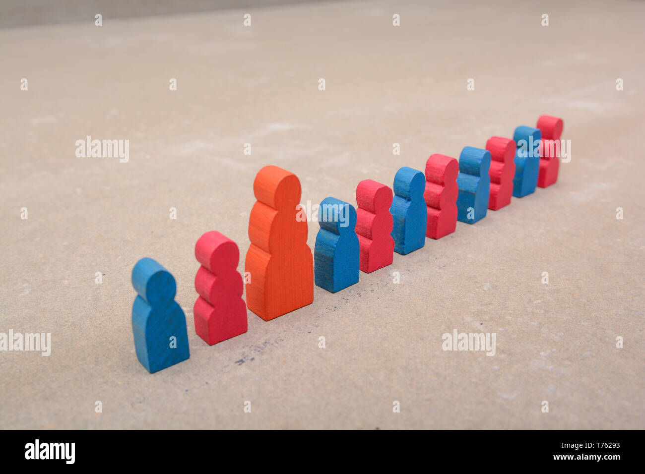 Busy mother. Large group of toy figures of children with mother figure ...