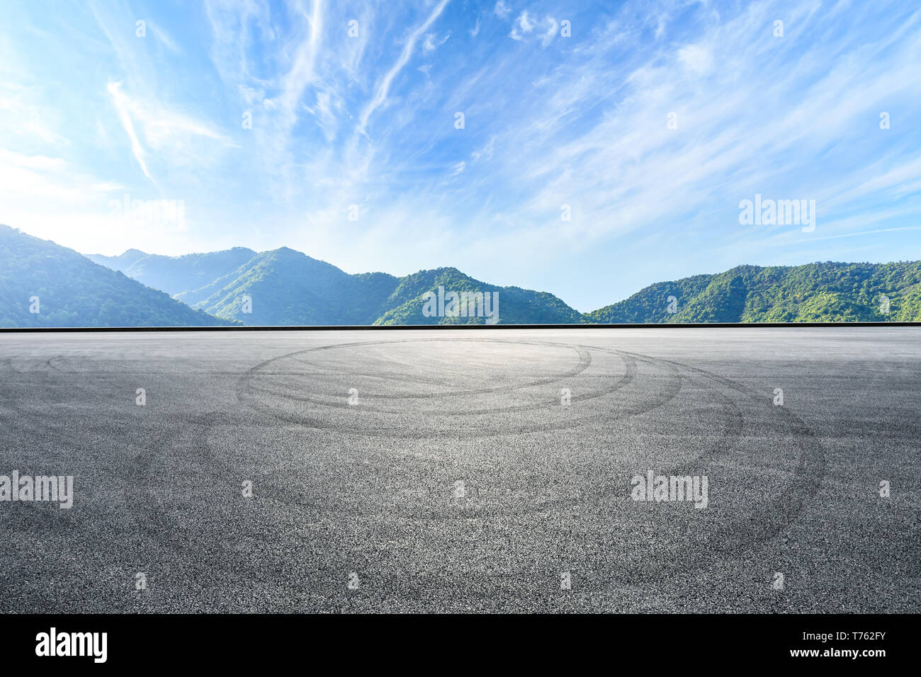 Empty asphalt race track and beautiful natural landscape Stock Photo ...