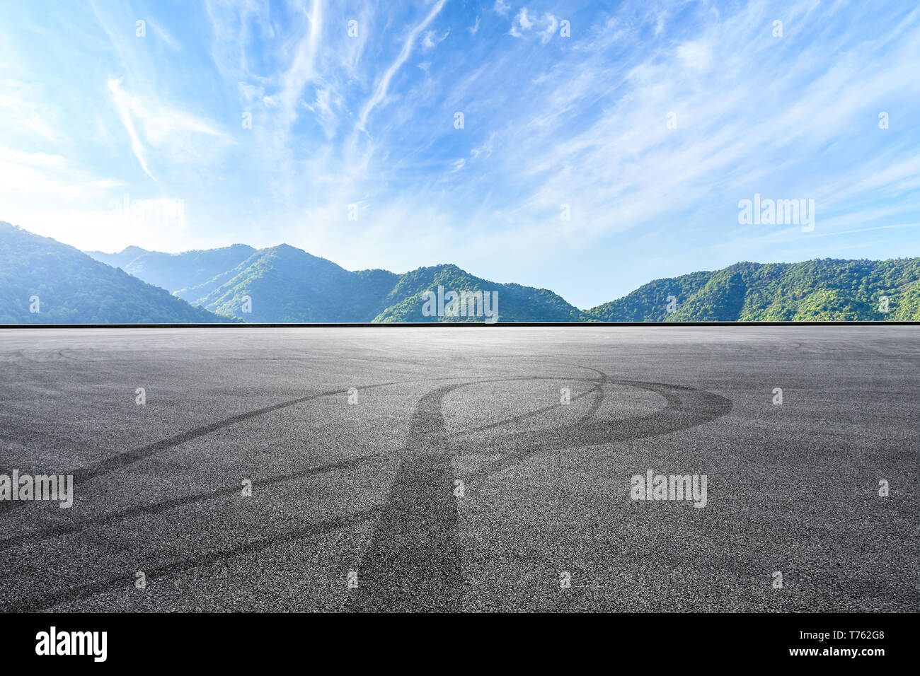 Empty asphalt race track and beautiful natural landscape Stock Photo ...