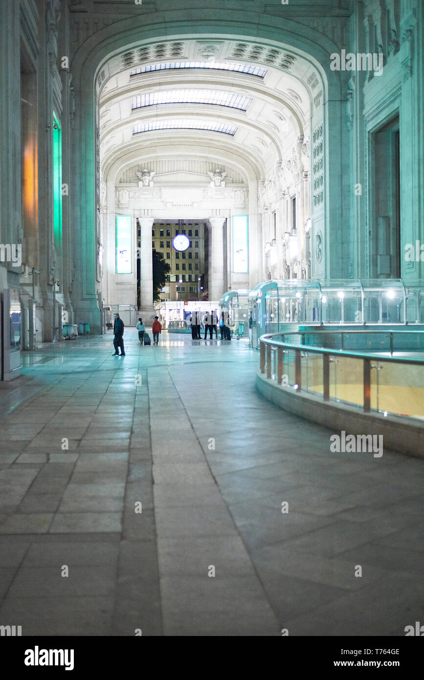 Clock hanging in central station in Milan, Italy with grand marble ...