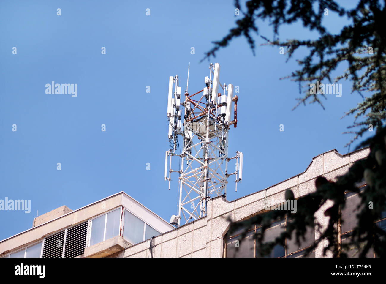 Telecommunication base stations network repeaters on the roof of ...
