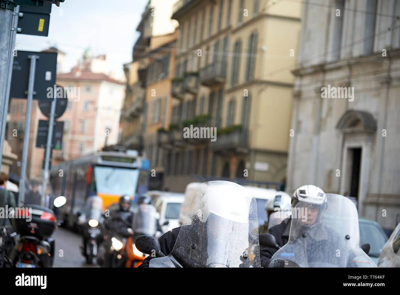Traffic on a busy street in the city centre of Milan in daylight Stock ...