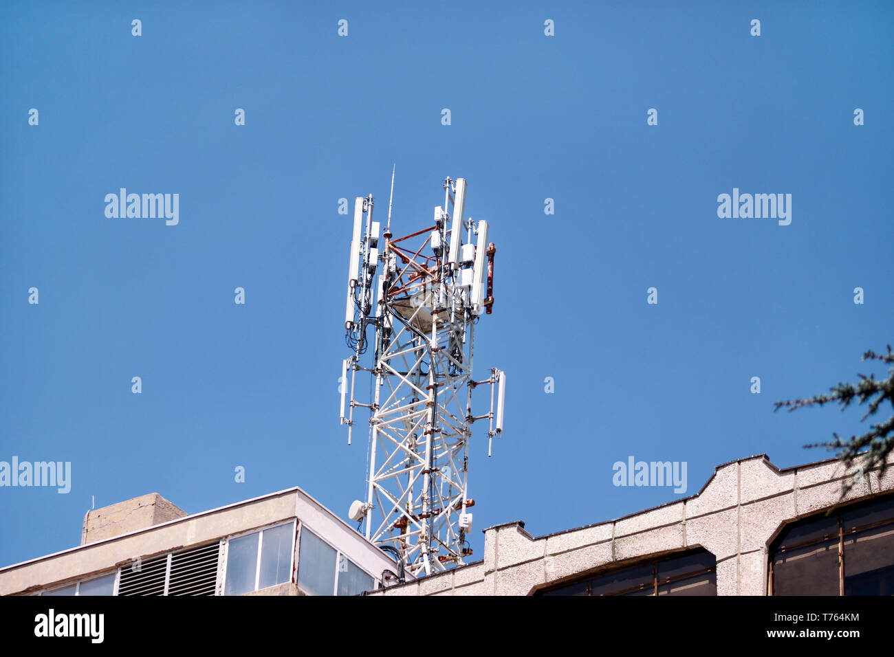 Telecommunication base stations network repeaters on the roof of ...