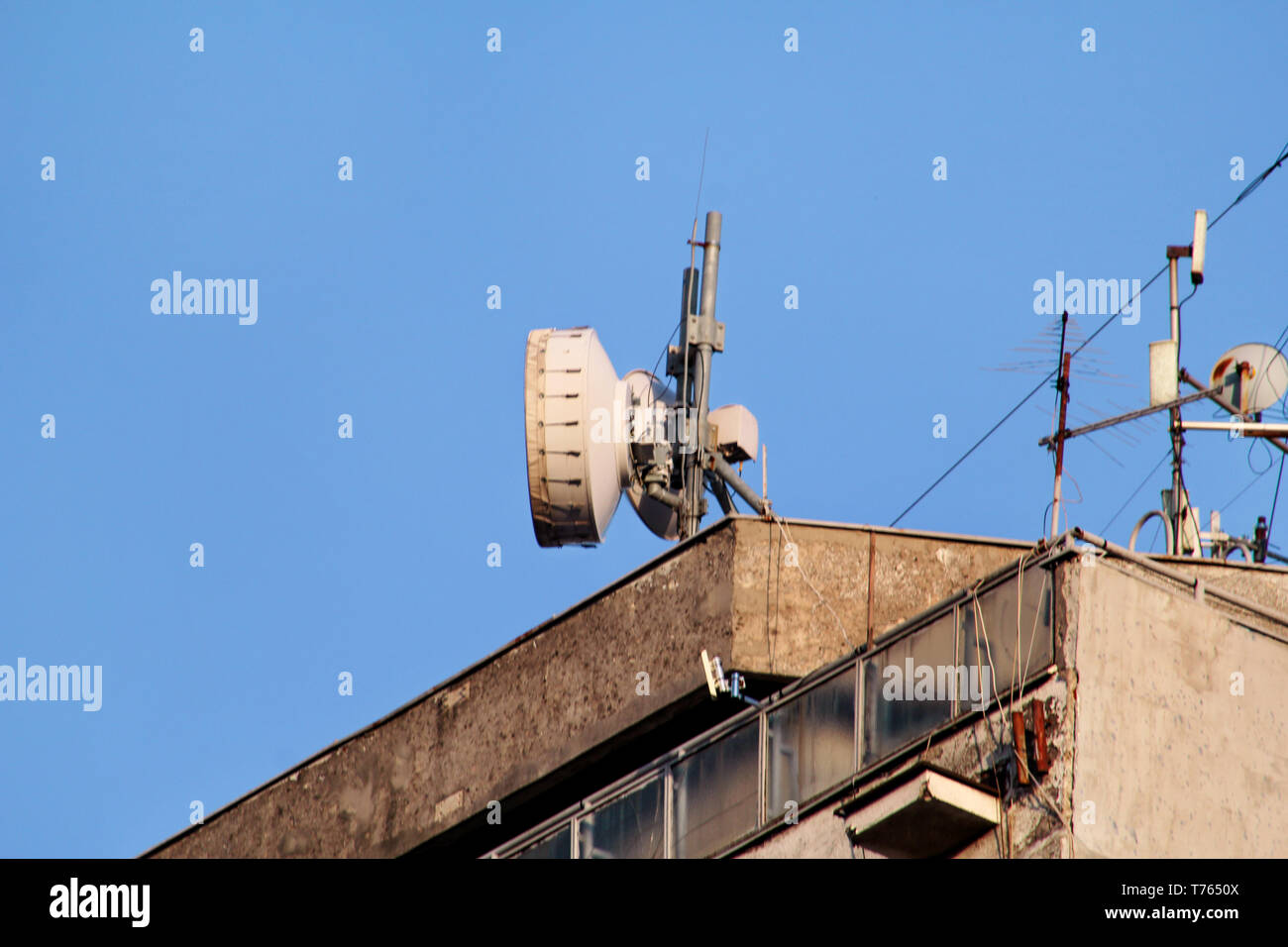 Telecommunication base stations network repeaters on the roof of ...