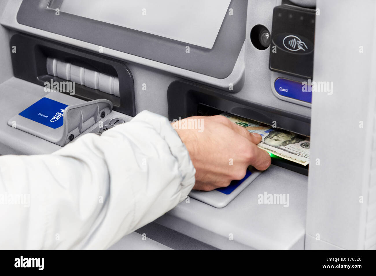 Taking money from cash machine hi-res stock photography and images - Alamy