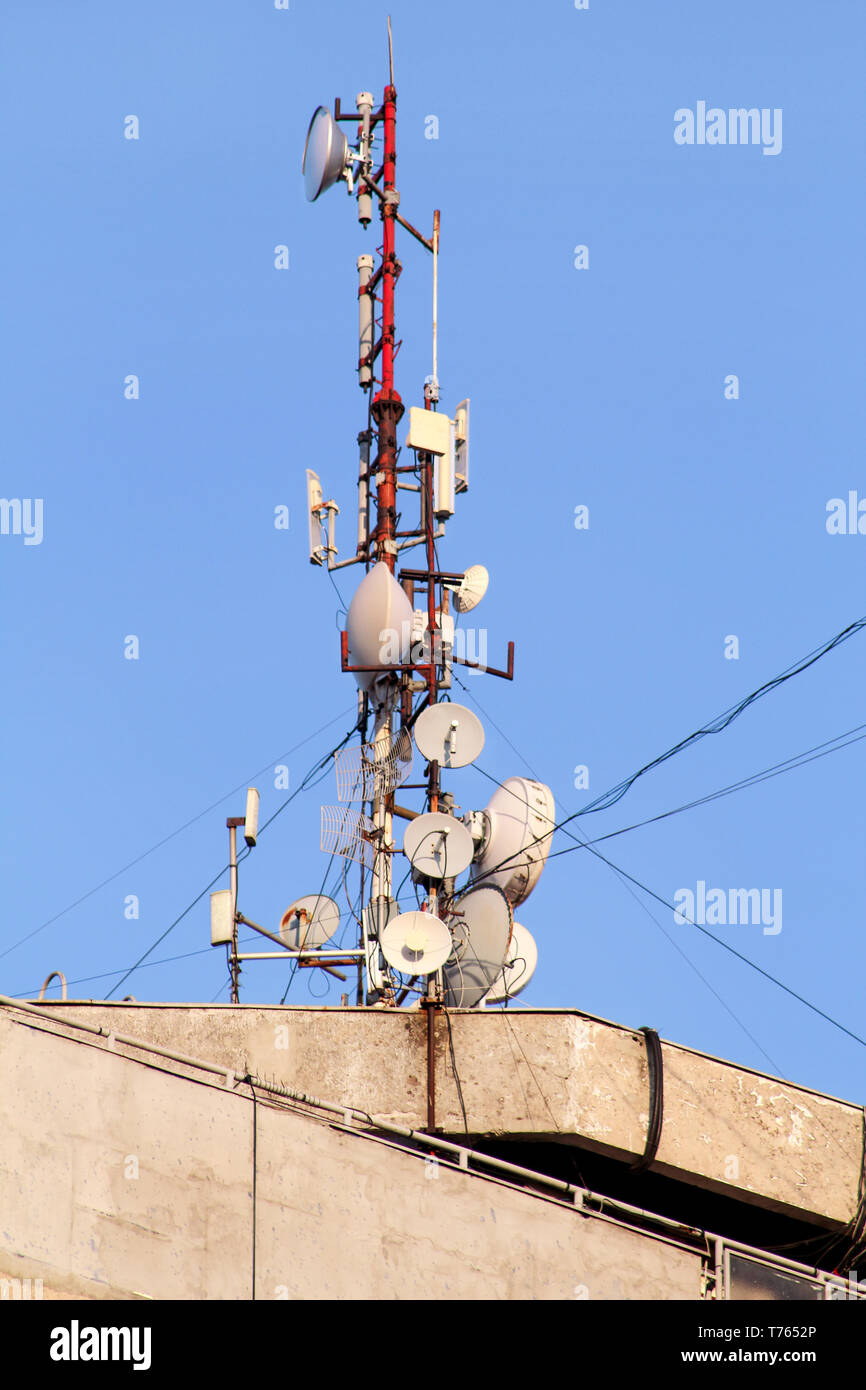 Telecommunication base stations network repeaters on the roof of ...