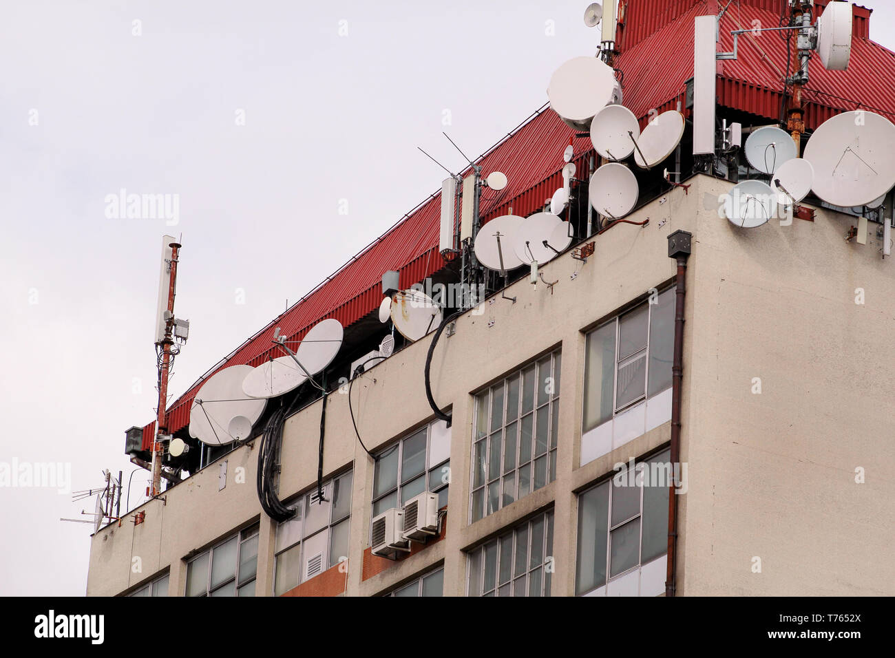 Telecommunication base stations network repeaters on the roof of ...