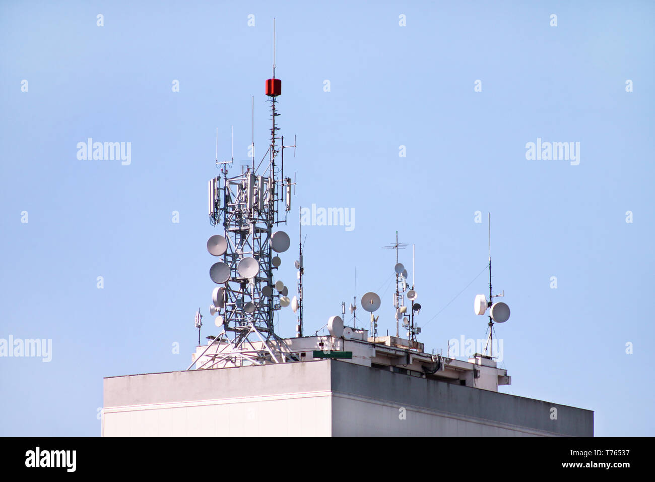 Telecommunication base stations network repeaters on the roof of ...