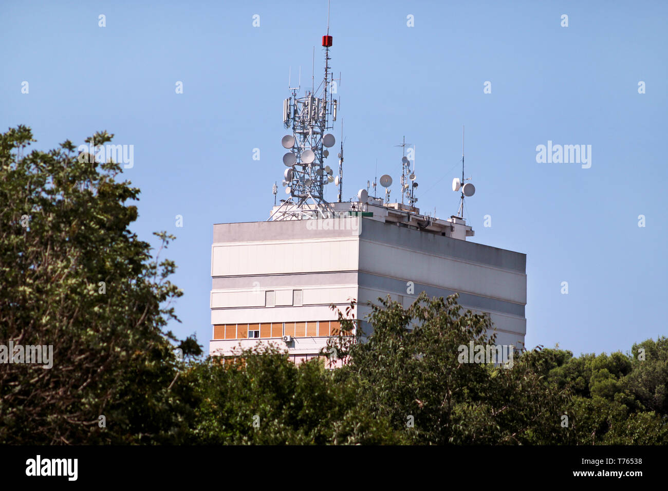 Telecommunication base stations network repeaters on the roof of ...