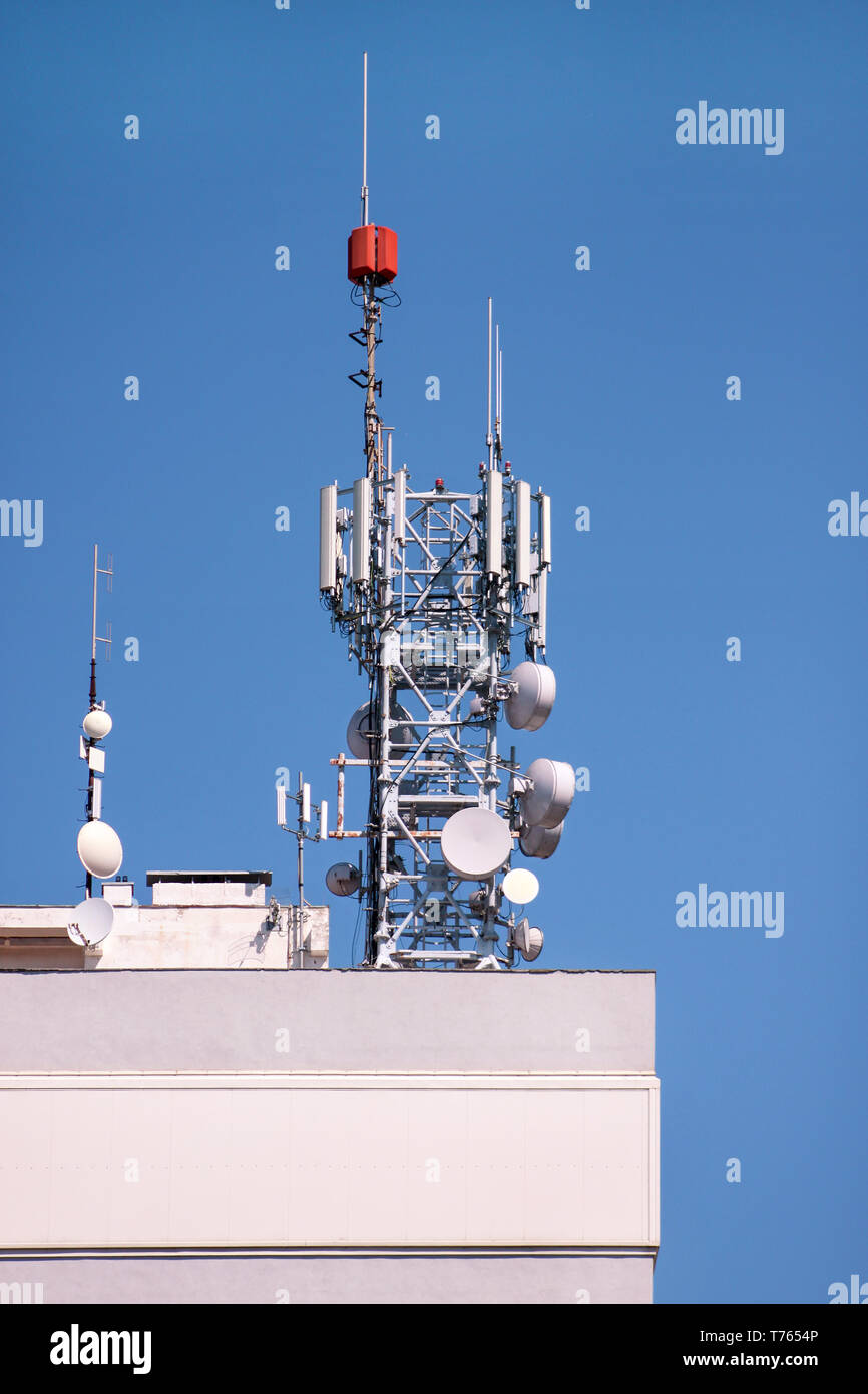 Telecommunication base stations network repeaters on the roof of ...