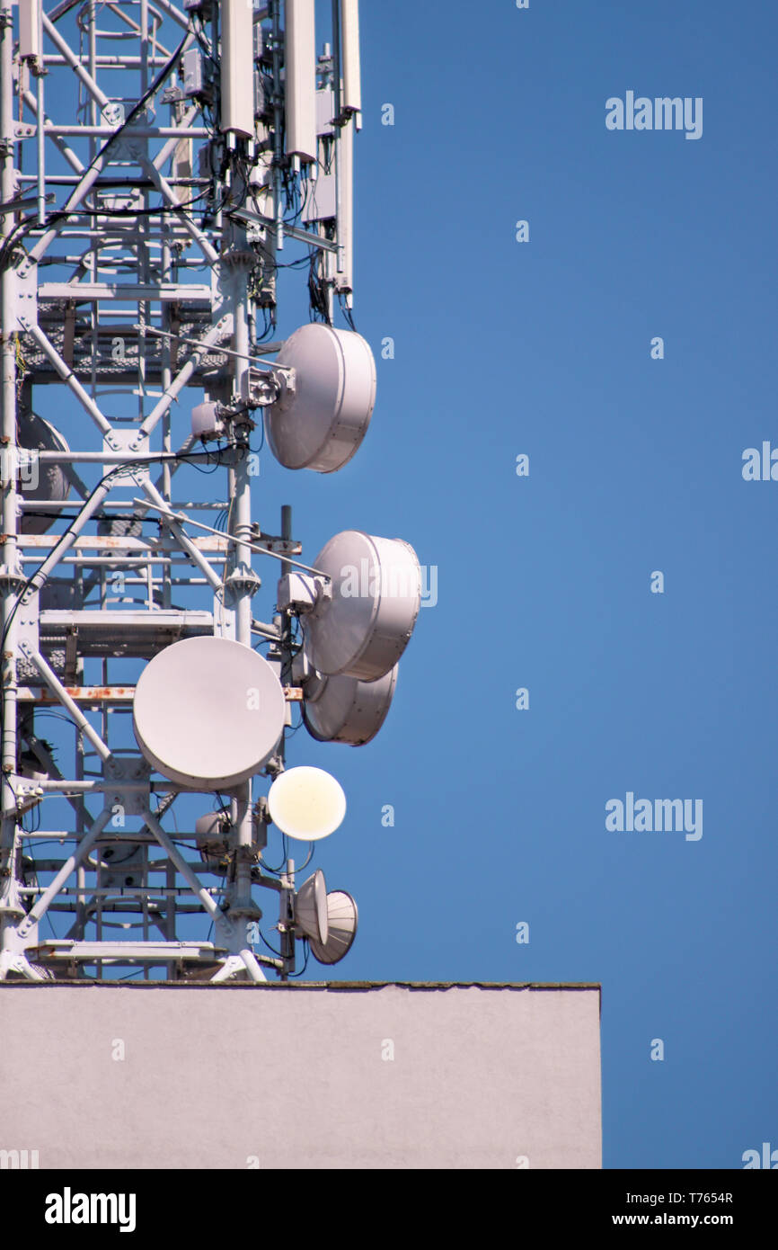 Telecommunication base stations network repeaters on the roof of ...
