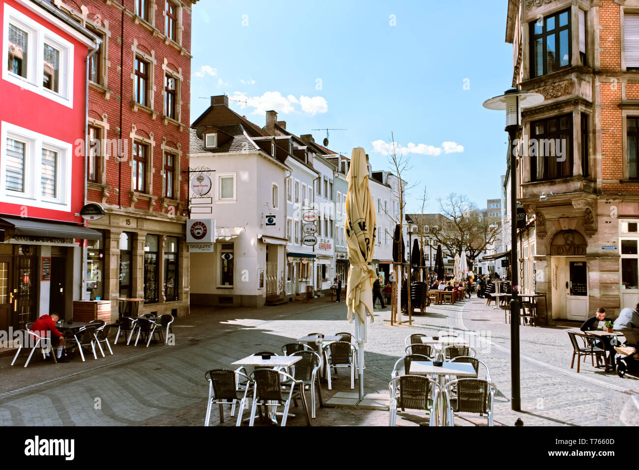 Sunny spring day in St. Johanner Markt, Saarbrücken, Germany, with bars ...