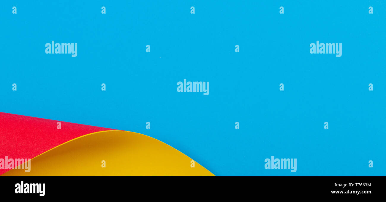 Abstract colorful background. Yellow red blue color paper in geometric ...