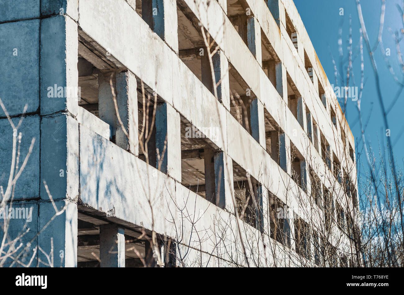 Abandoned unfinished concrete factory building Stock Photo - Alamy