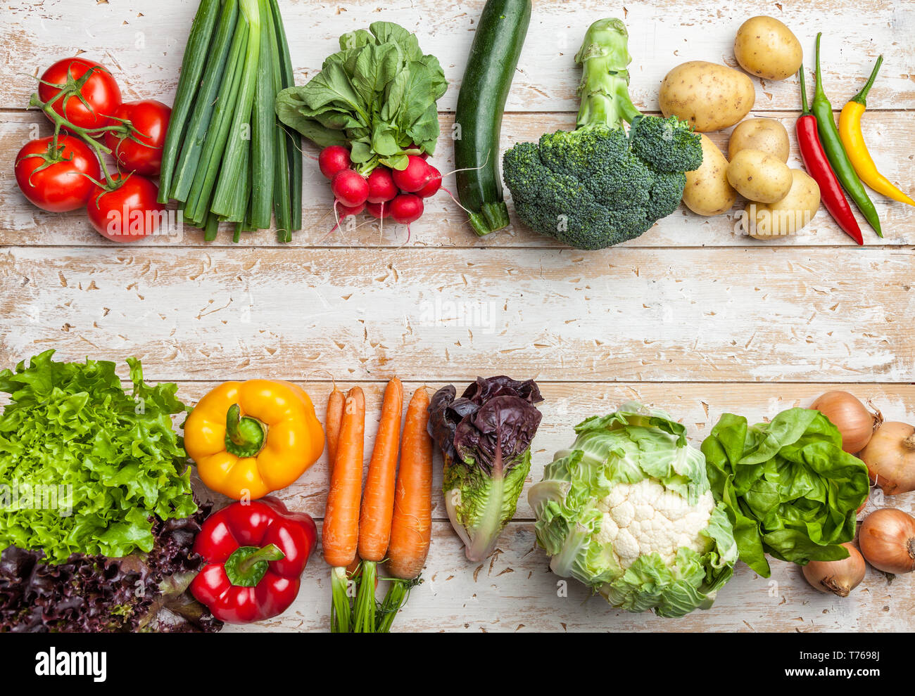 Fresh and healthy organic vegetables on a rustic background Stock Photo ...