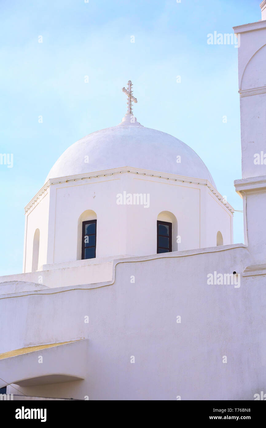 Greek orthodox church white dome against blue sky, Megalohori ...