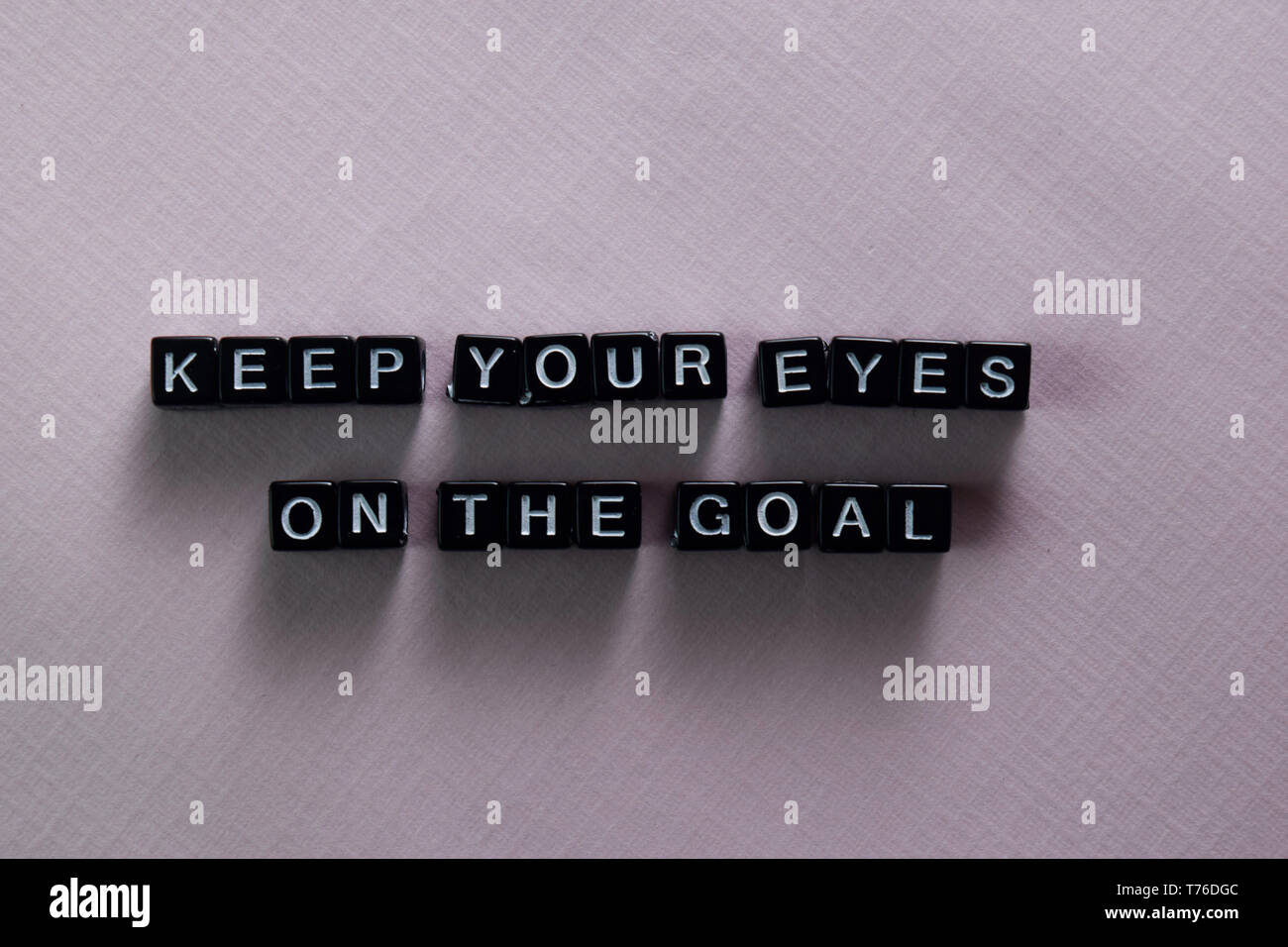 Keep your eyes on the goal on wooden blocks. Motivation and inspiration ...