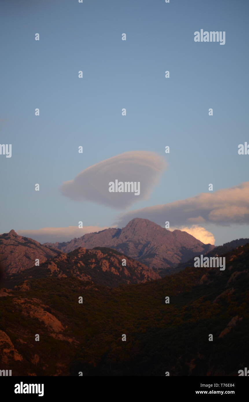 Triangle Cloud Over Mountain Stock Photo - Alamy