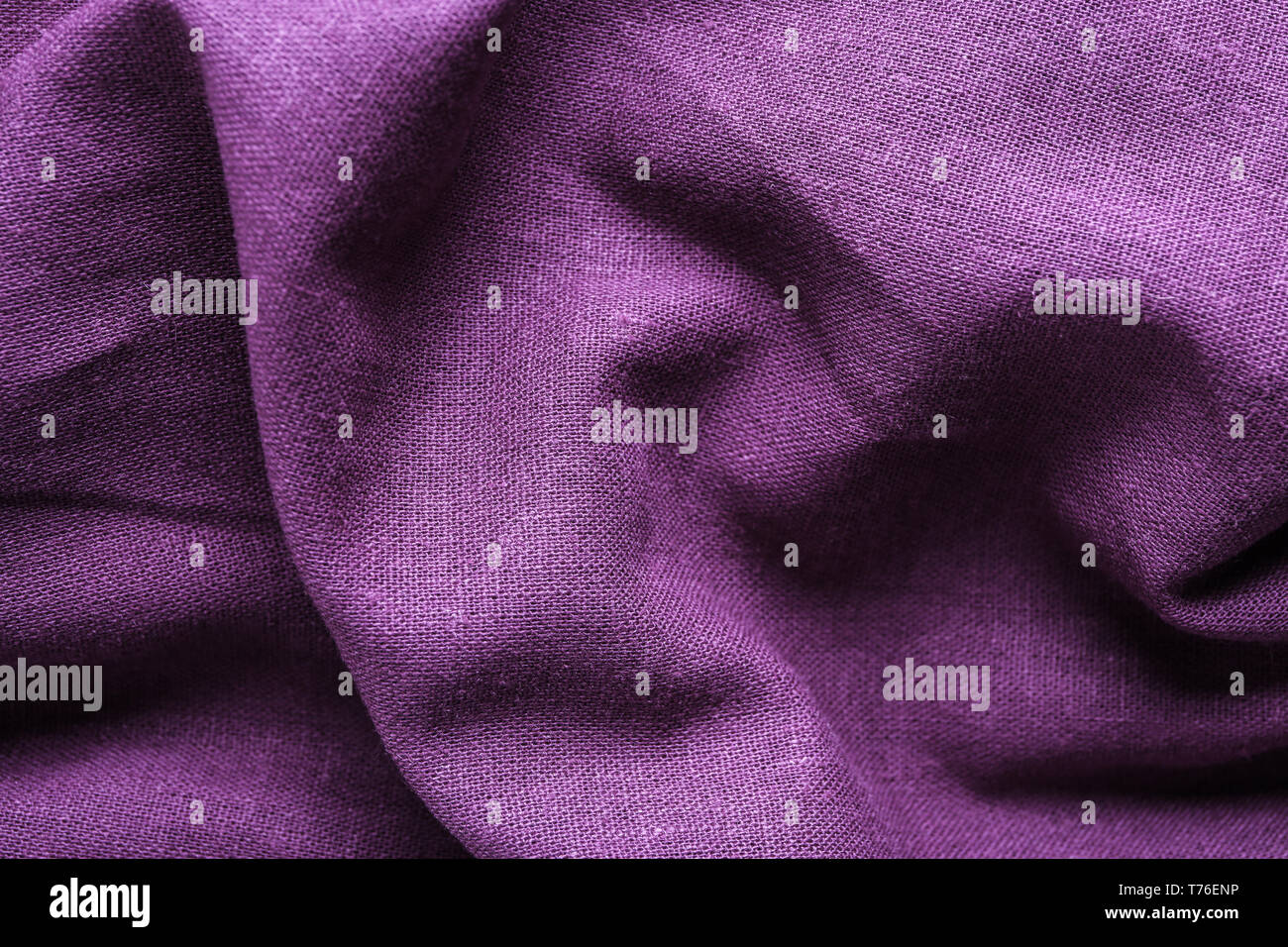 Purple fabric with folds, closeup Stock Photo - Alamy