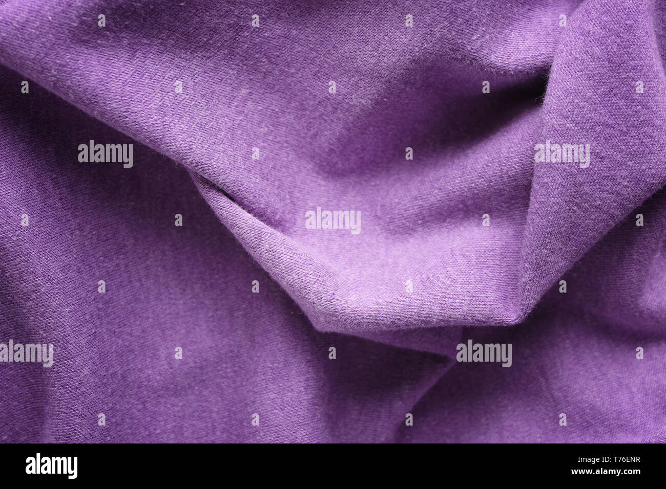 Texture of lilac fabric with folds Stock Photo - Alamy