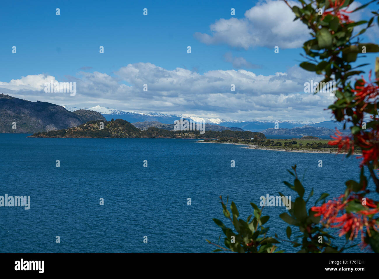 Landscape along the Carretera Austral next to the azure blue waters of ...