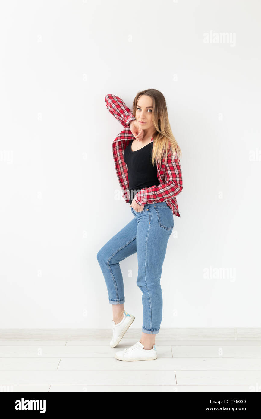 People and fashion concept - Full length image of woman posing sideways ...